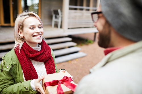 유토이미지 | Young blond pretty Caucasian woman getting present from her ...