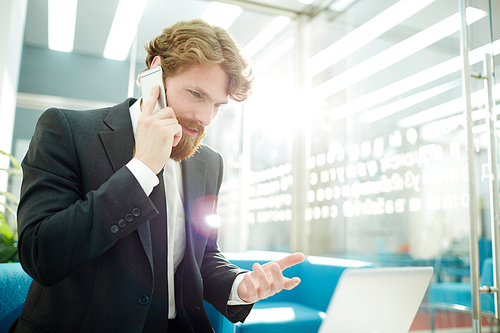 Busy salesman consulting client on the phone in office | 유토이미지 | 상세페이지 ...