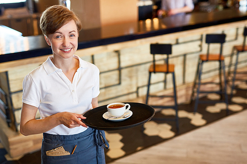 유토이미지 | Portrait of attractive waitress in uniform with toothy smile ...