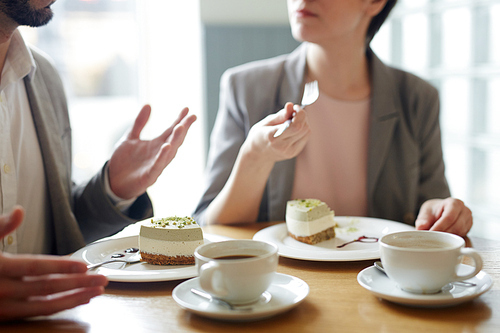 Two humans having tasty dessert and talking in cafe | 유토이미지 | 상세페이지 ...