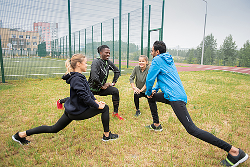유토이미지 | group of young multicultural friendly people doing stretching ...