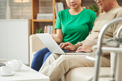 Cropped image of old man learning how to use computer | 유토이미지 | 상세페이지 ...
