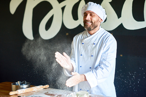 The baker shaking his hands from the flour | 유토이미지 | 상세페이지 | 베이직샵 | 사진 ...