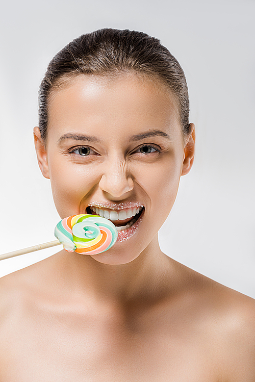 young woman with sugar on lips biting colored lollipop | 유토이미지 | 상세페이지 ...