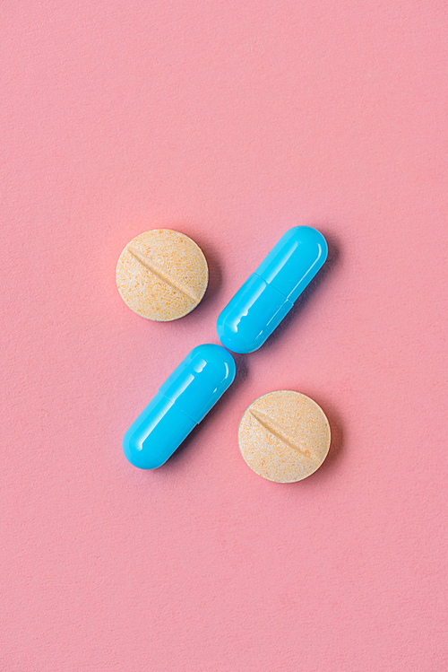 top view of percent sign made of pills on pink | 유토이미지 | 상세페이지 | 베이직샵 ...