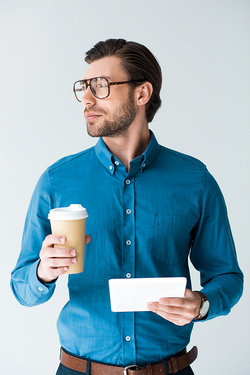 유토이미지 | confident young man with paper cup of coffee and tablet ...