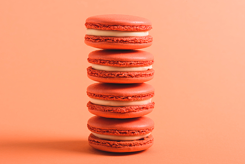 stack of coral macarons on coral background, color of 2019 concept | 유토 ...