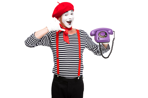 유토이미지 | happy mime holding ultra violet retro stationary telephone and ...