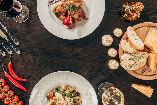 top view of chicken and pasta with pike perch fillet on table | 유토이미지 ...