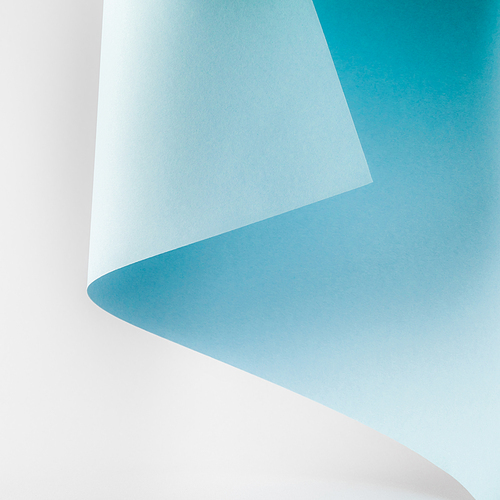 유토이미지 | bright blue paper sheet on grey background