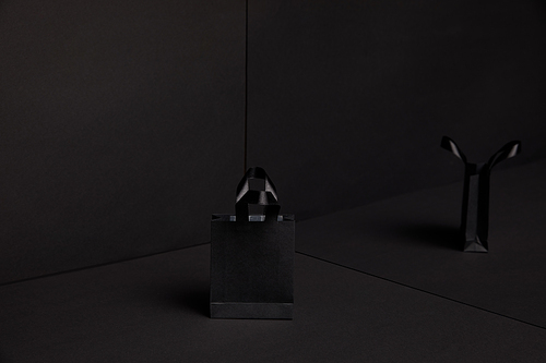 유토이미지 | close up view of black paper shopping bag with mirror ...