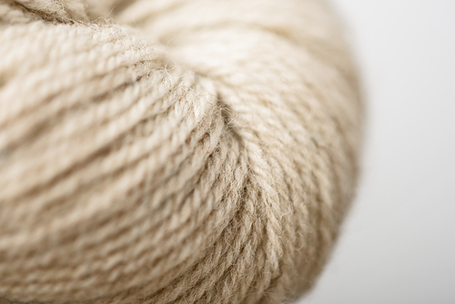 유토이미지 | full frame of beige knitting clew on grey background