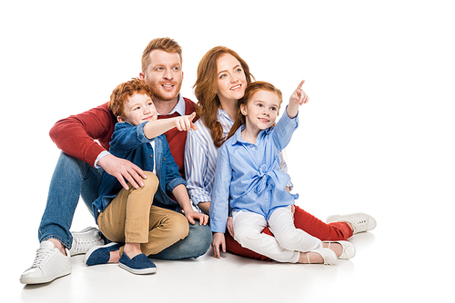 유토이미지 | smiling family with two kids pointing away with fingers ...