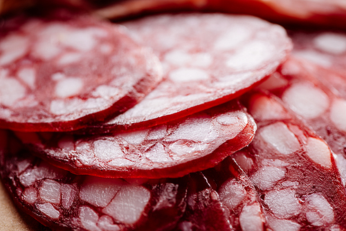 유토이미지 | close up view of delicious fat sliced salami