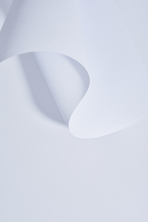 close up view of curved paper sheet on white background | 유토이미지 | 상세페이지 ...