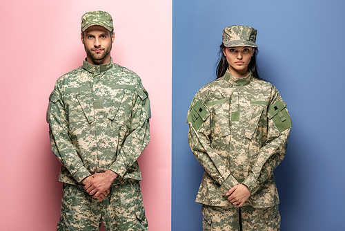 유토이미지 | man and woman in military uniform on blue and pink