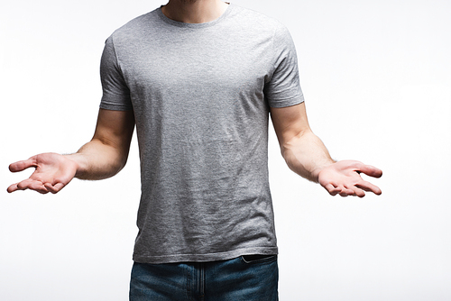 partial view of man showing shrug gesture isolated on grey, human ...