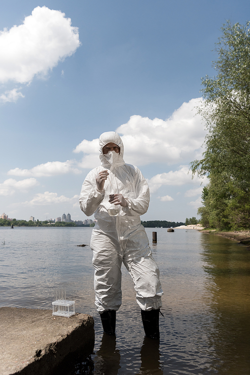 유토이미지 | full length view of water inspector in protective costume ...