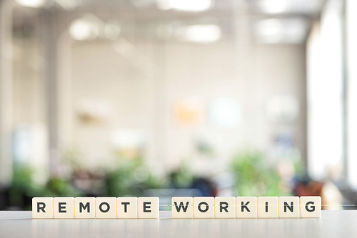 white cubes with remote working lettering on white desk | 유토이미지 | 상세페이지 ...