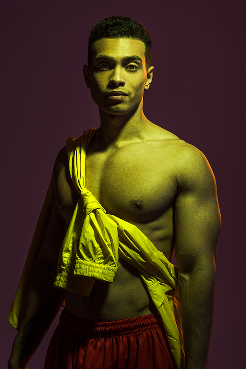 handsome mixed red man with muscular torso on dark background | 유토이미지 ...