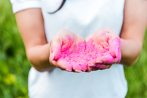 close up of young woman holding pink powder in hands | 유토이미지 | 상세페이지 ...