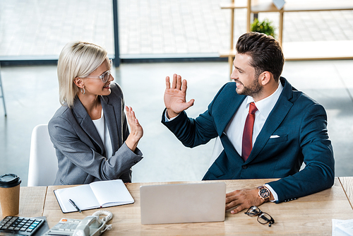 유토이미지 | overhead view of happy man and woman in glasses giving high ...