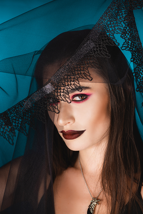 evil bride with makeup through black veil on blue | 유토이미지 | 상세페이지 ...