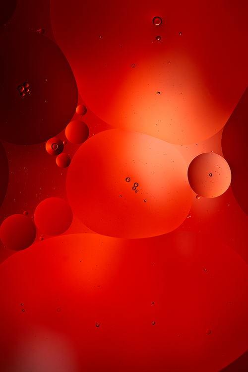 Beautiful red color abstract background from mixed water and oil ...