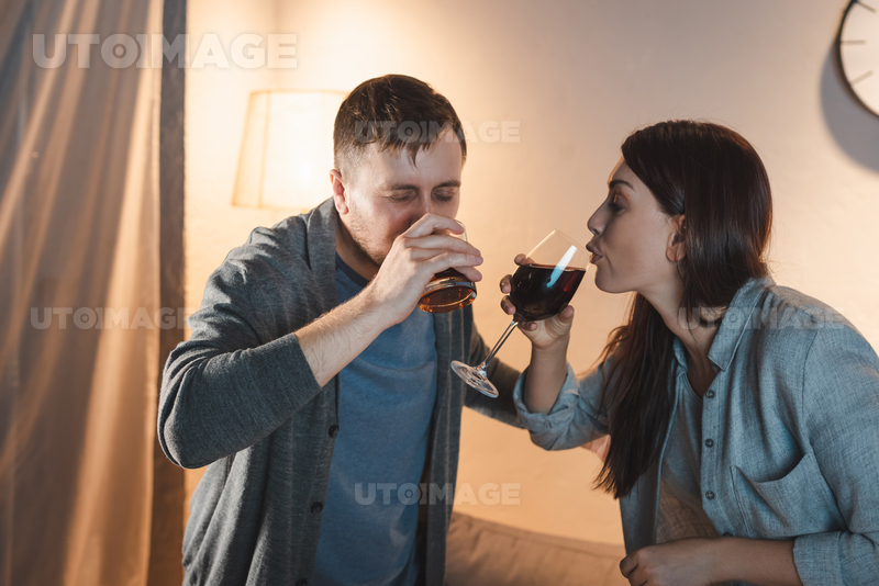 alcohol-addicted couple drinking whiskey and wine at home together | 유토 ...