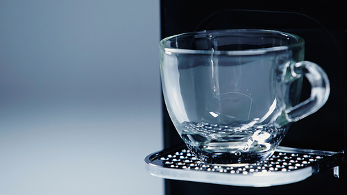close up of automatic coffee maker with glass cup on grey,stock image ...