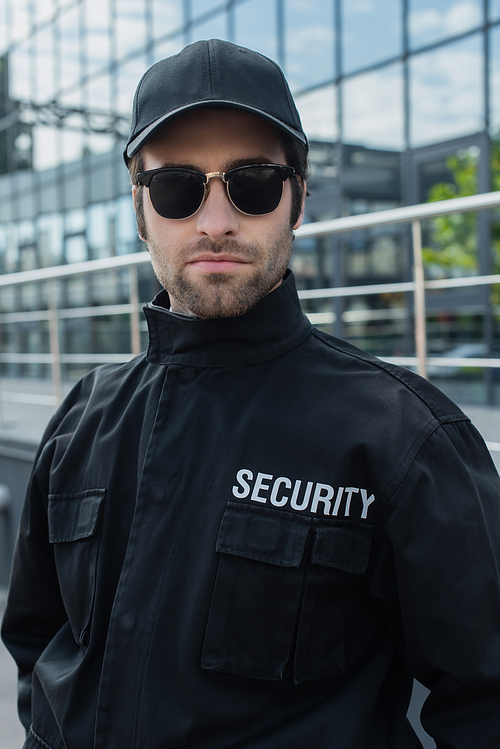 security man in black uniform and sunglasses outdoors | 유토이미지 | 상세페이지 ...