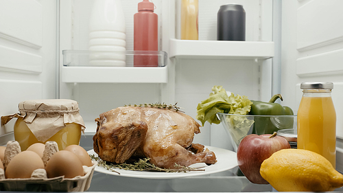 roasted turkey prepared for thanksgiving dinner near fresh vegetables ...
